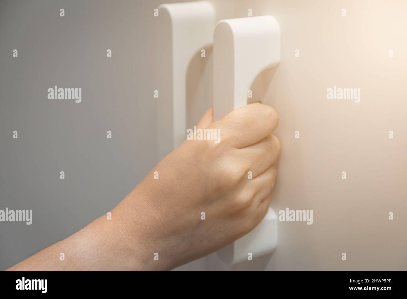 Woman hand open wardrobe use for background Stock Photo - Alamy