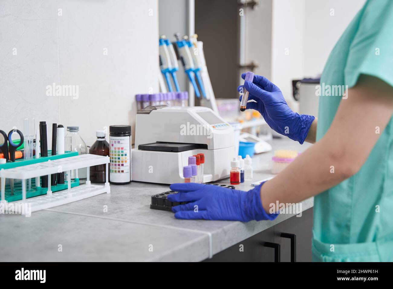 Doctor working with medical stuff in the laboratory Stock Photo - Alamy