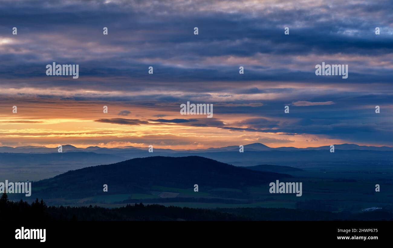 Sunset with dramatic cloudy sky over mountains shape, beautiful nature ...