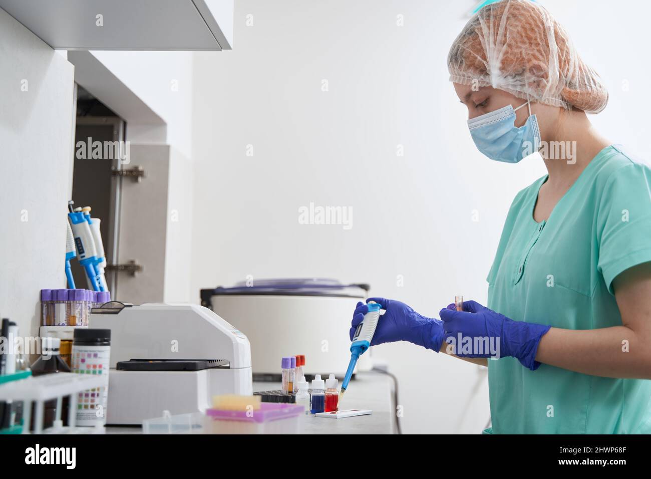 Female doctor doing medical research in laboratory Stock Photo - Alamy