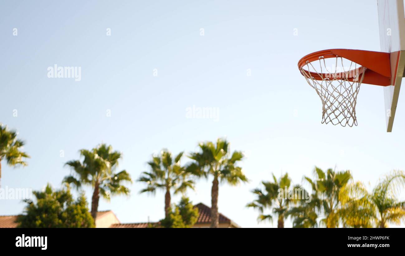 Orange hoop, net and backboard for basket ball game outside, basketball ...