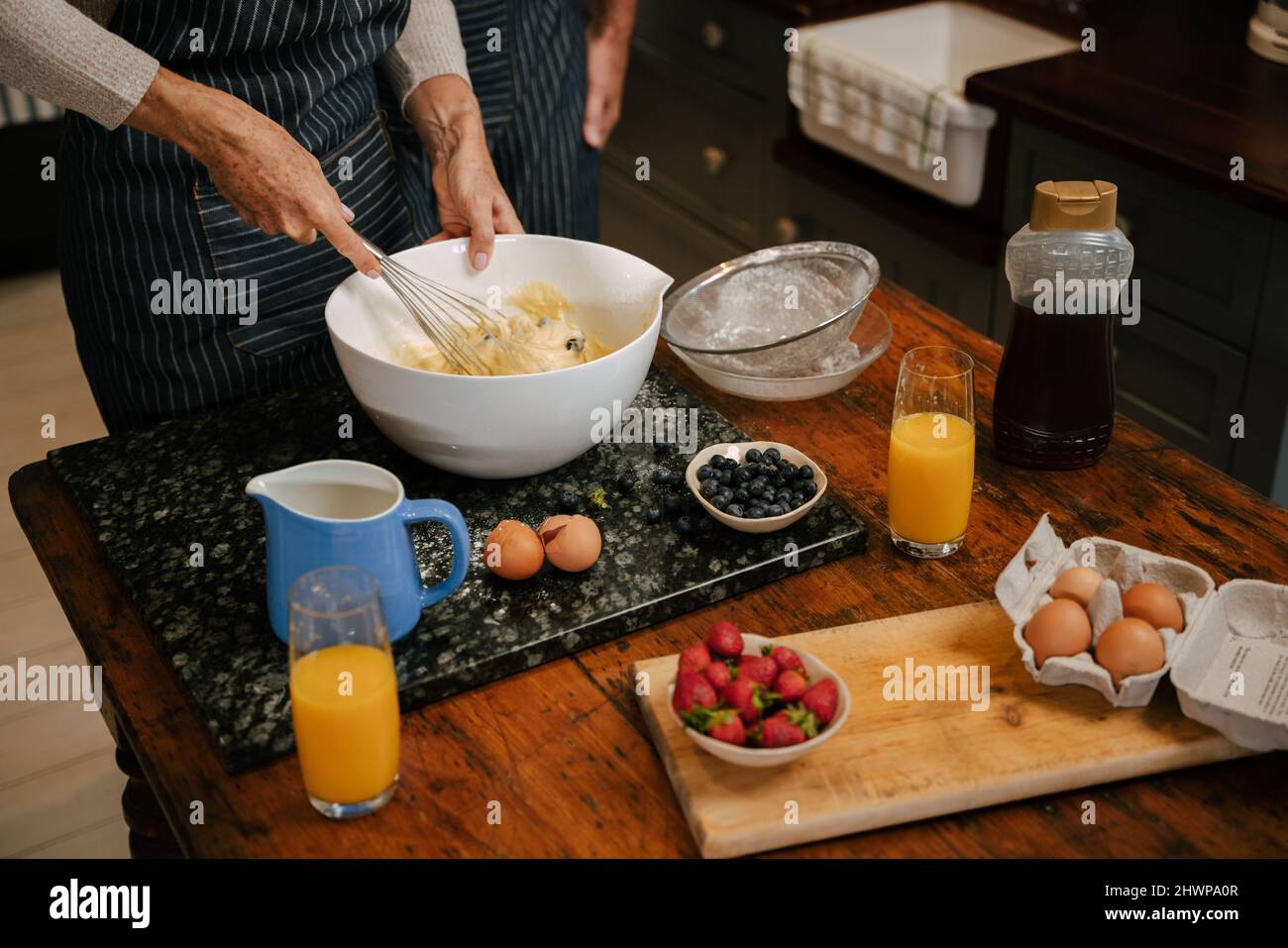 Senior woman husband baking hi-res stock photography and images - Alamy