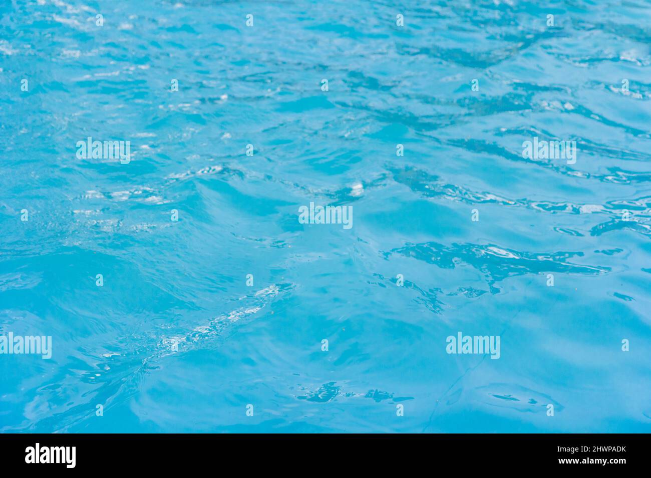 Pool Blue water reflection texture background Stock Photo - Alamy