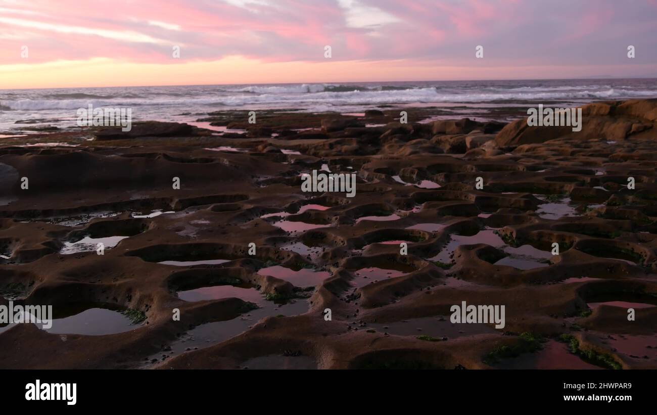 Eroded rock formation, tide pool shape in La Jolla, California coast ...