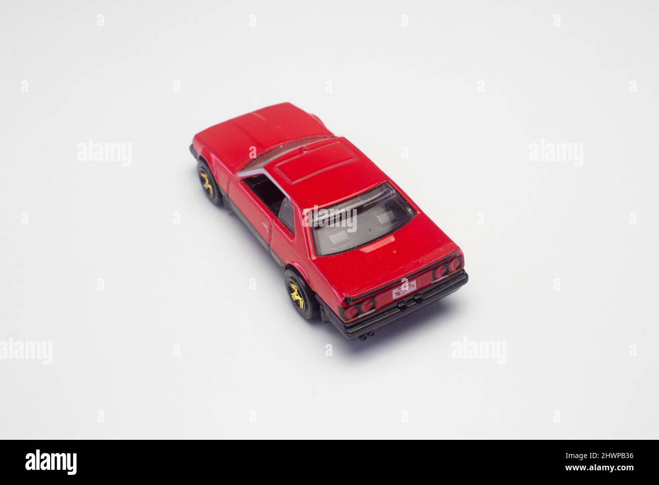 Bright red diecast coupe car Stock Photo - Alamy