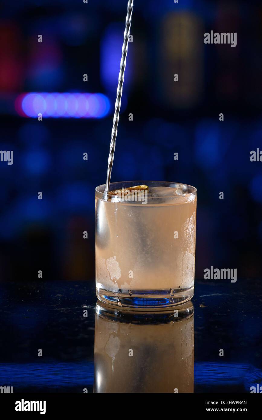 beige refreshing coctail on a bar desk Stock Photo - Alamy