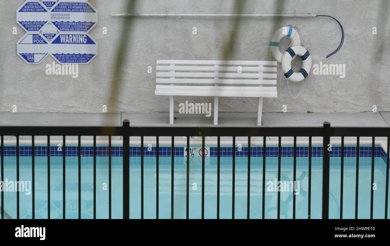 Round rescue lifebuoy for safety on water in swimming pool by motel ...