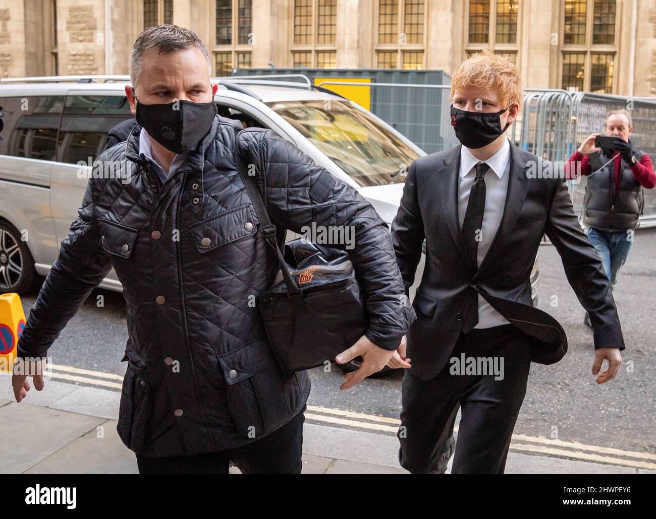 Ed Sheeran (right) arrives at the Rolls Building at the High Court in ...