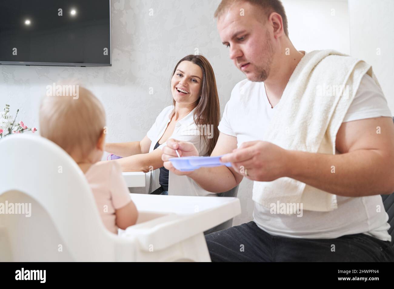 Happy positive photo of friendly family at home Stock Photo - Alamy