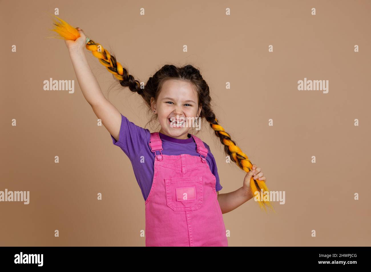 Yellow braids female hi-res stock photography and images - Alamy