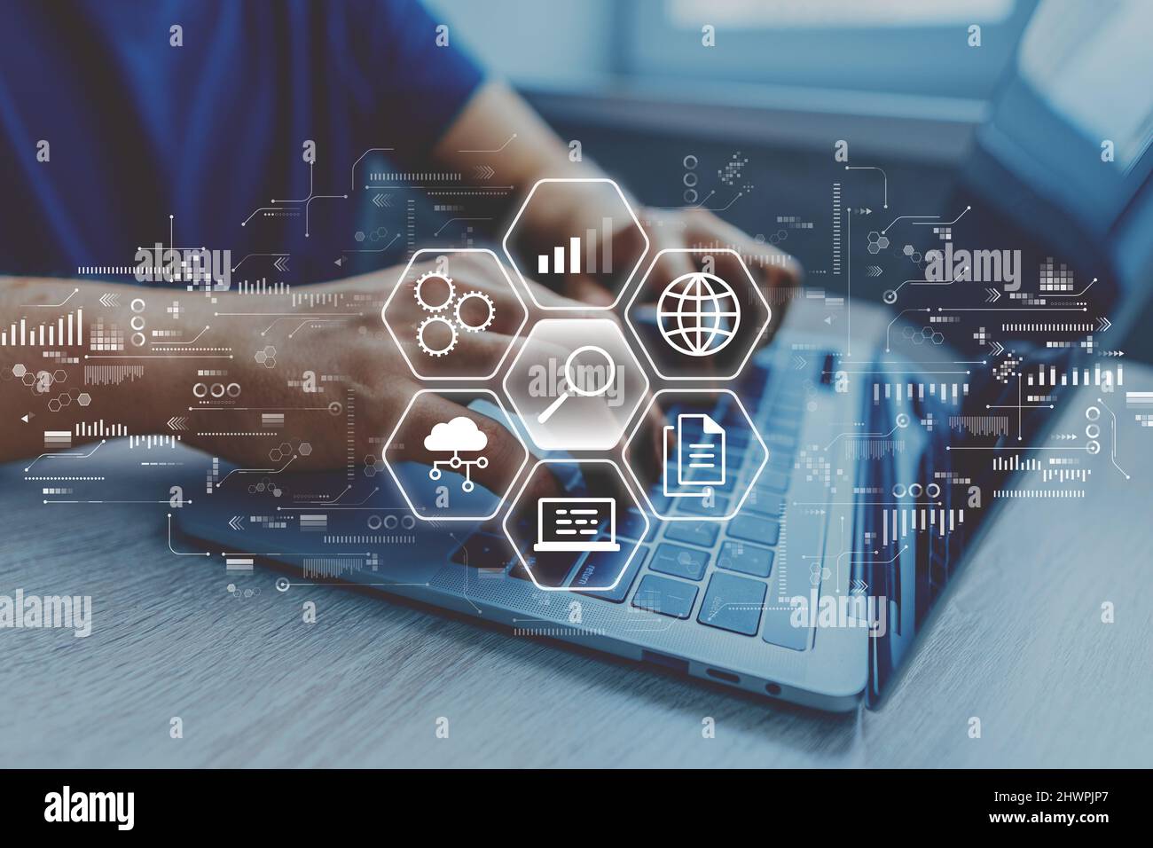 Data discovery concept. Data collection and aggregation. The person is working on a laptop Stock ...