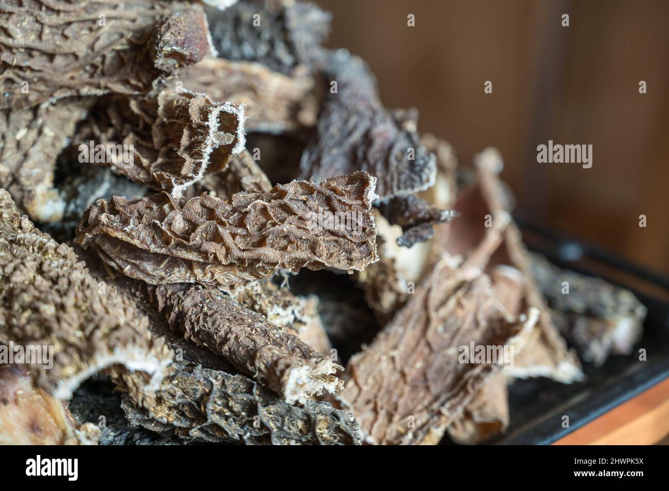 Pet Treats. Dried beef tripe.Pieces of natural, wholesome chewable dog treats Stock Photo - Alamy