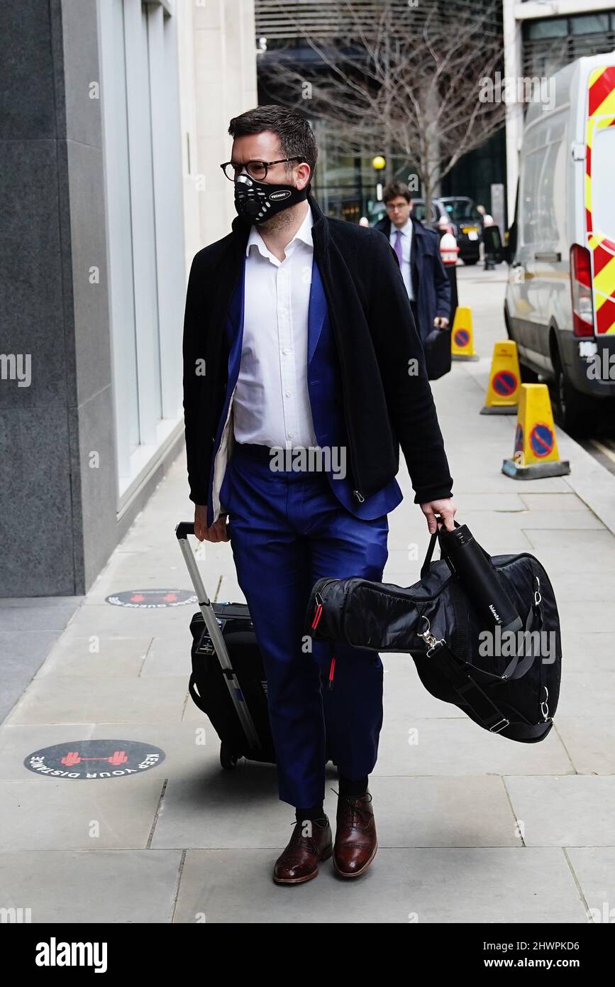A guitar is carried into the Rolls Building at the High Court, London ...