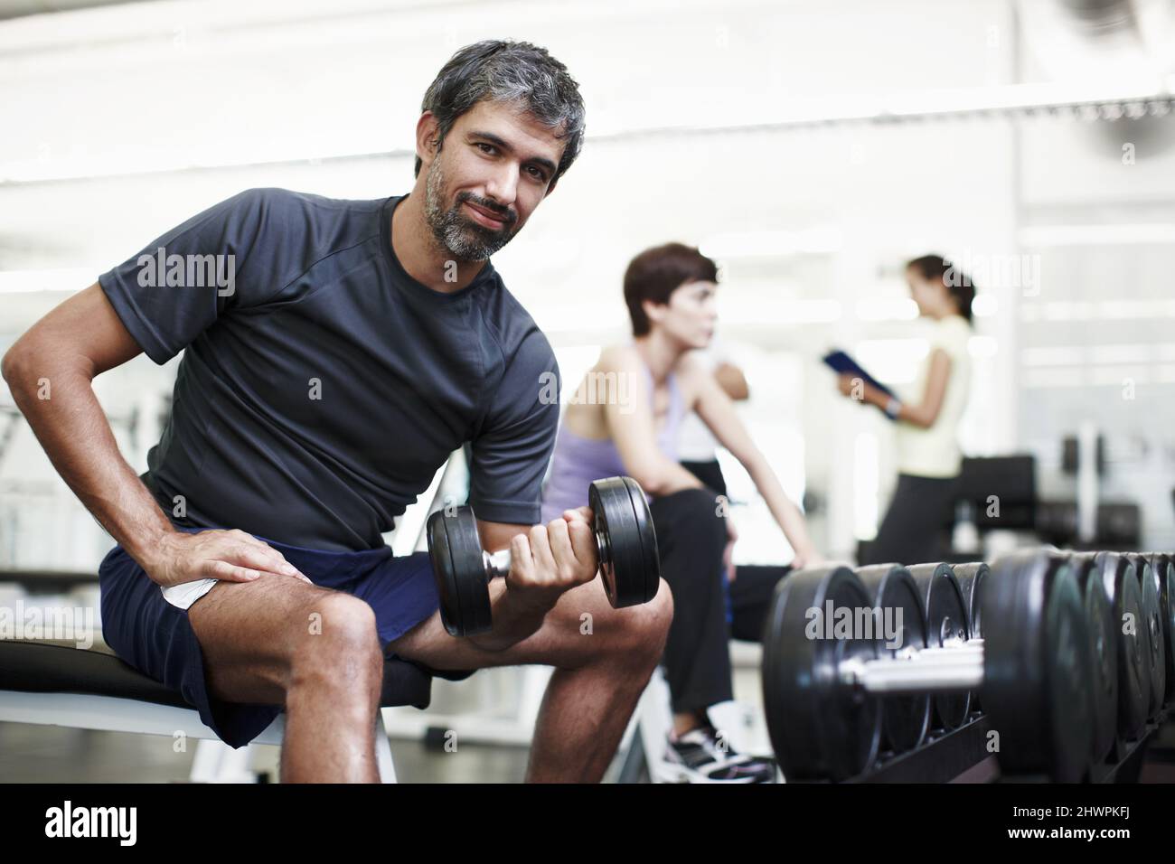 Everyone should hit the gym now and then. Cropped portrait of a ...