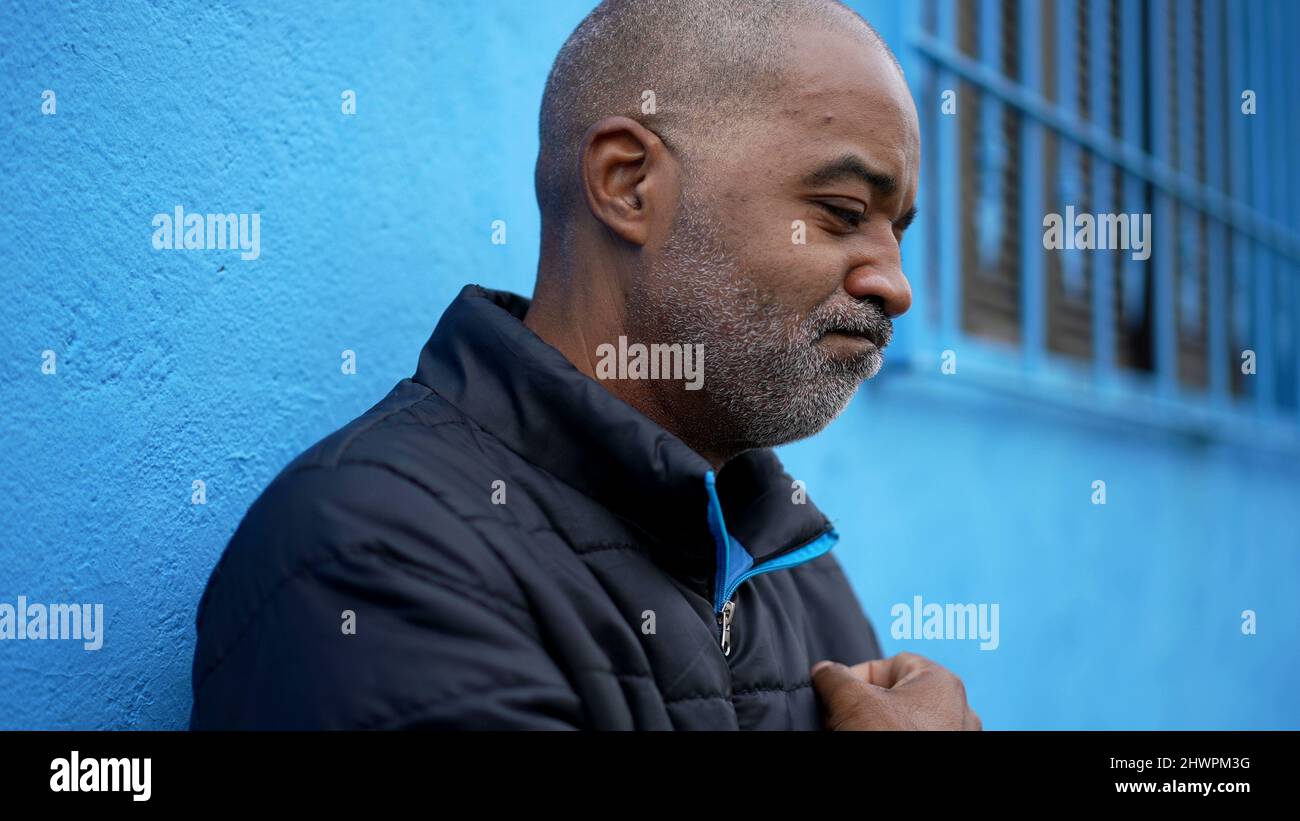 A pensive African American senior man feeling regret a black older ...