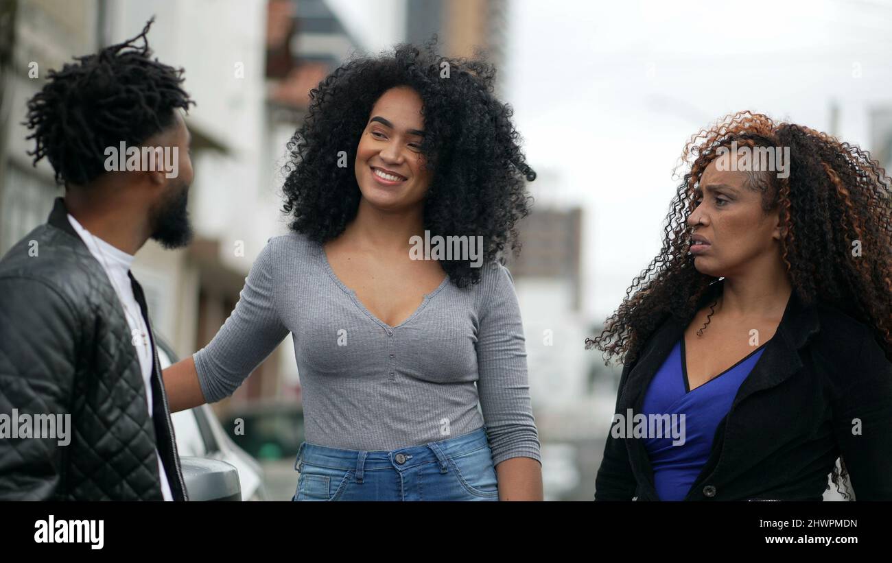 Three Brazilians hanging out talking laughing and smiling Stock Photo ...