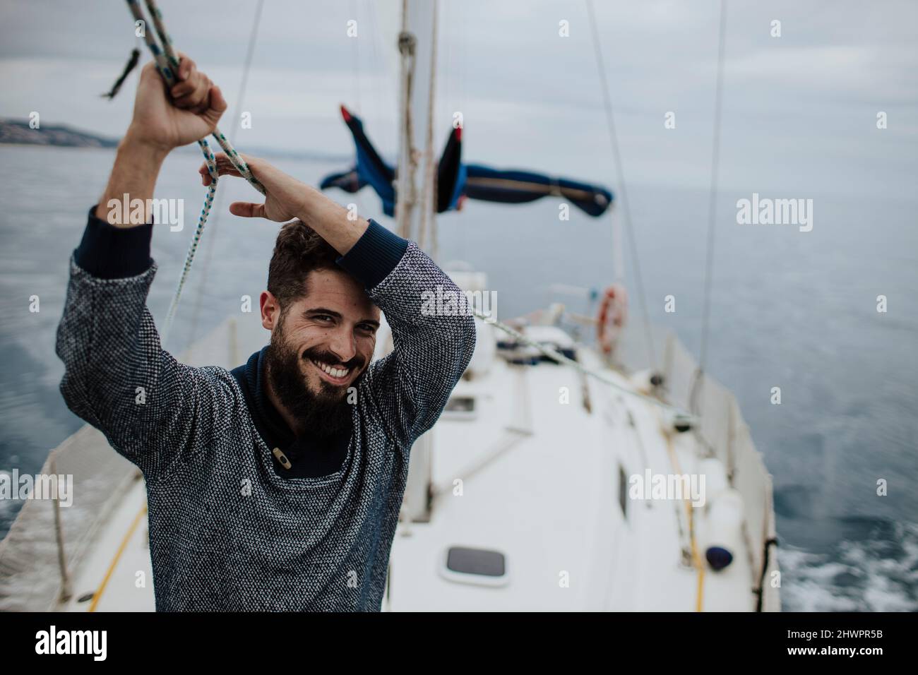 Man holding rope hi-res stock photography and images - Alamy
