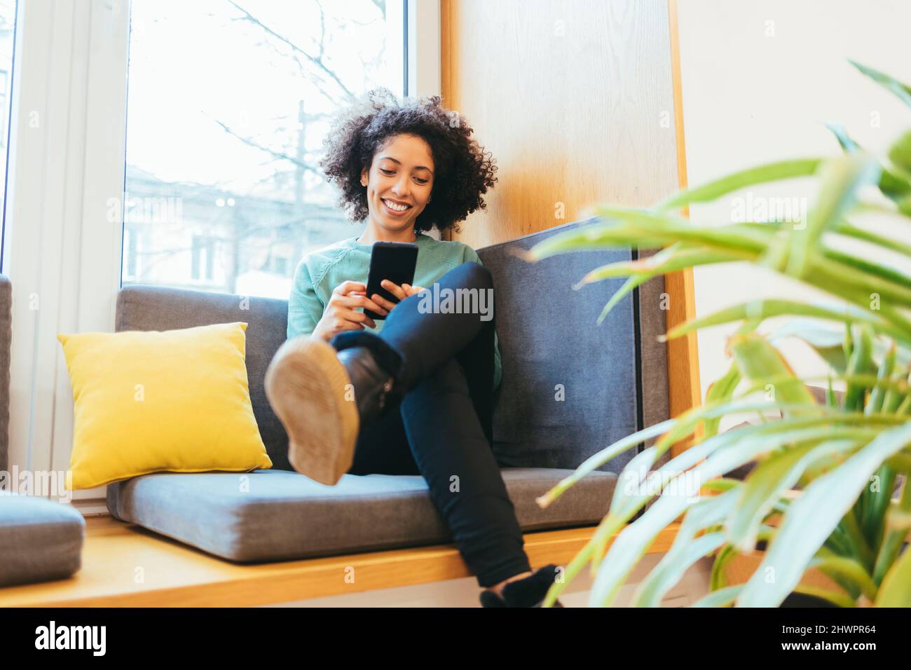 Mobile phone with copy space on sofa hi-res stock photography and ...
