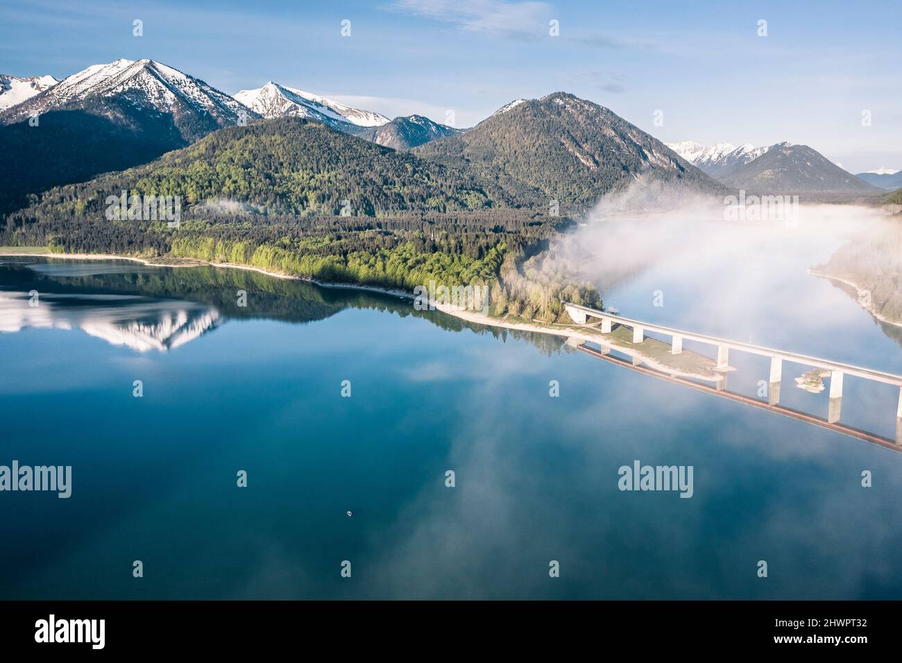 Sylvenstein Dam and Faller-klamm-brucke bridge surrounded by fog in ...