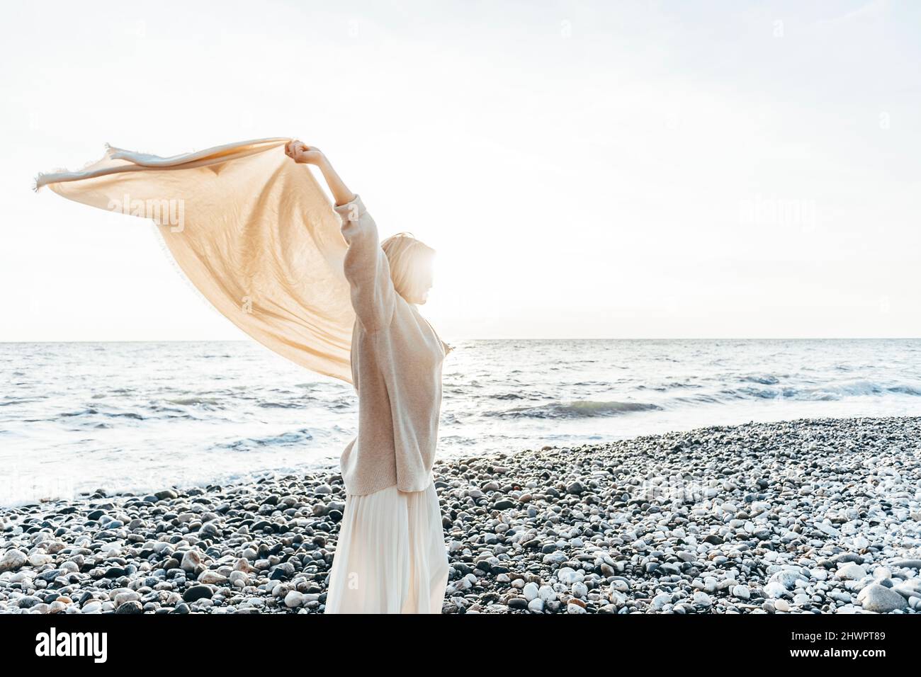 Woman holding aloft hi-res stock photography and images - Alamy