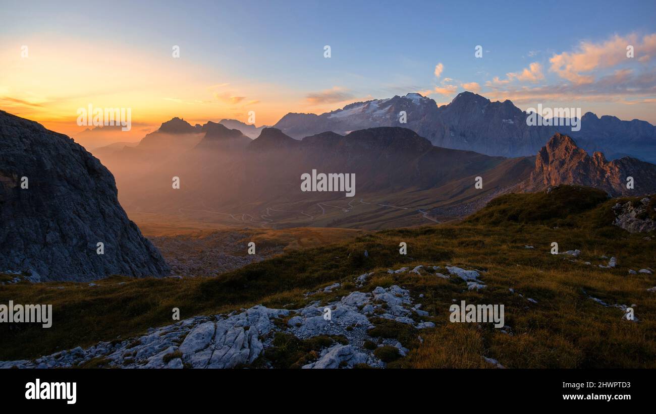 Scenic view of Marmolada and Pordoi Pass at sunrise, Trentino-alto ...