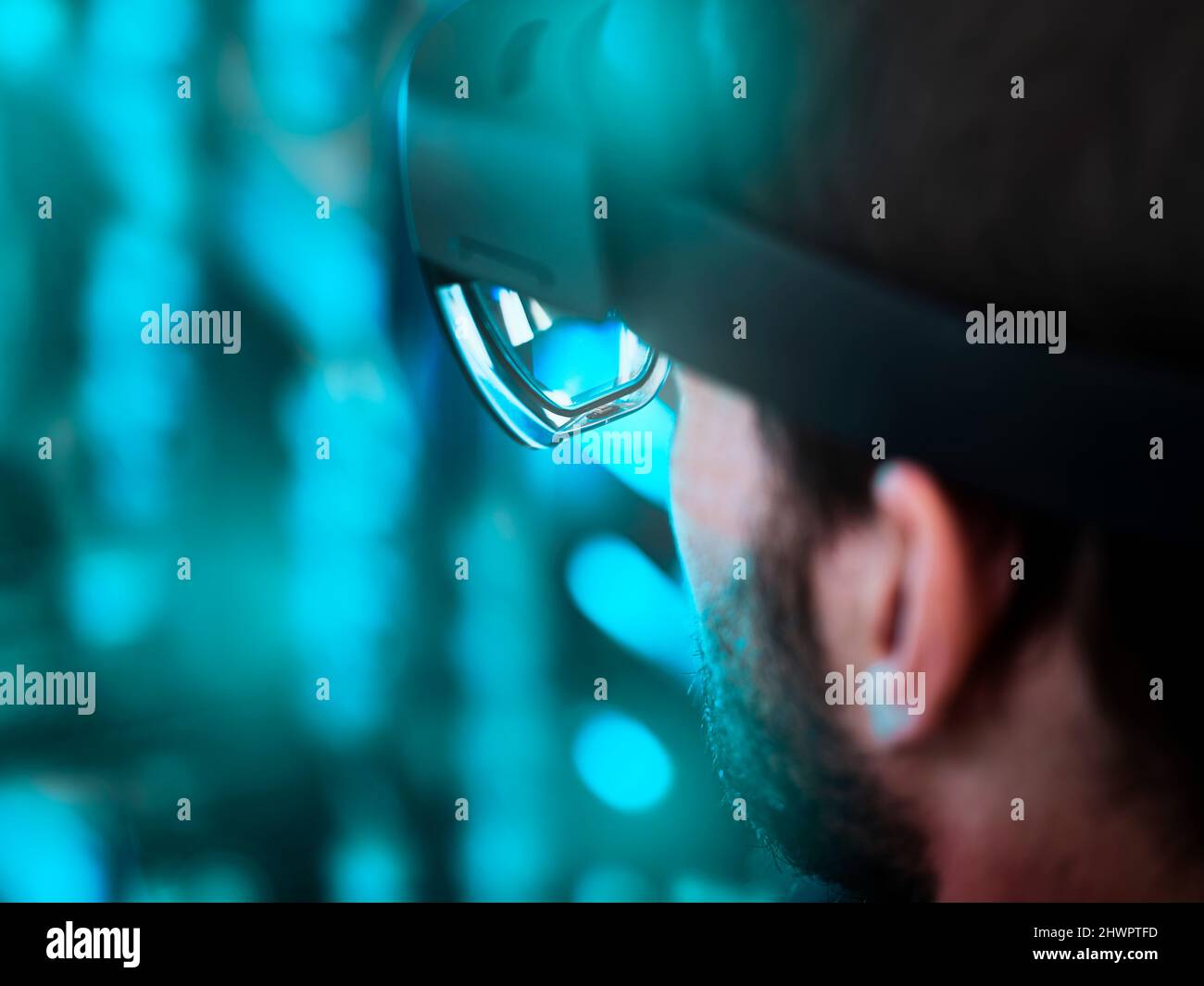 Technician wearing augmented reality glasses in industry Stock Photo ...