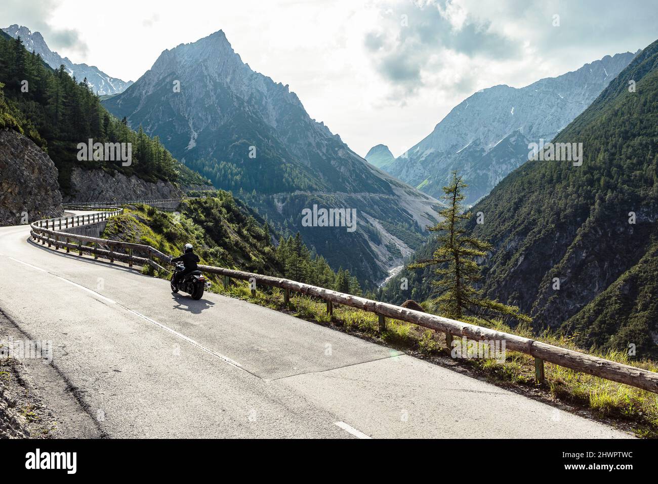 Biker riding motorcycle road lechtal valley hi-res stock photography ...
