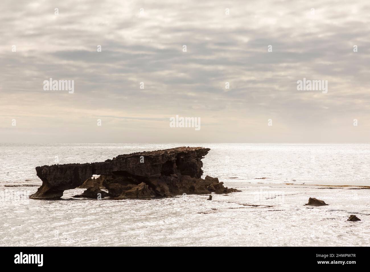 Cloudy sky doorway rock formation hi-res stock photography and images ...