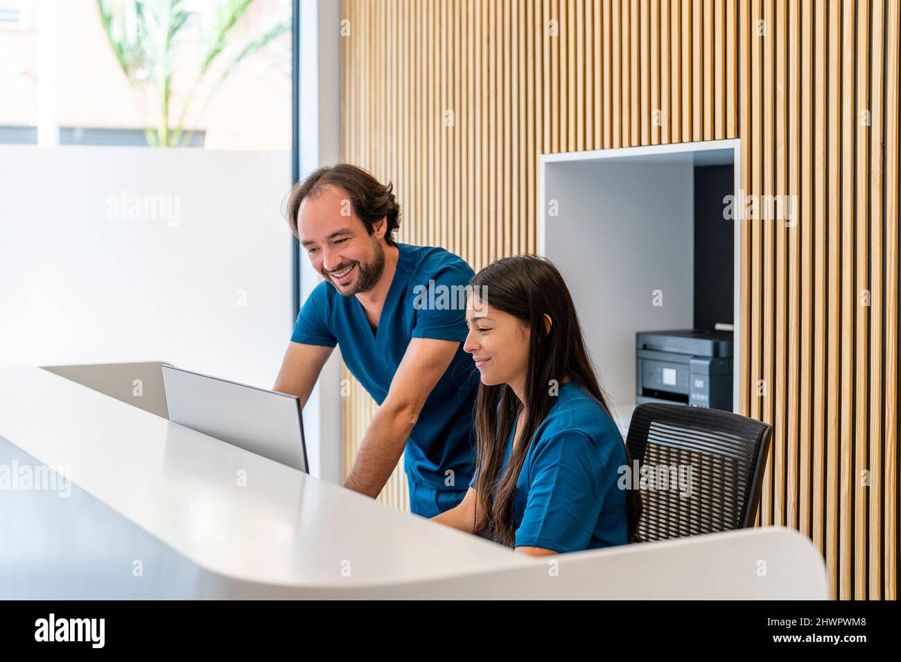 Doctor receptionist hi-res stock photography and images - Alamy