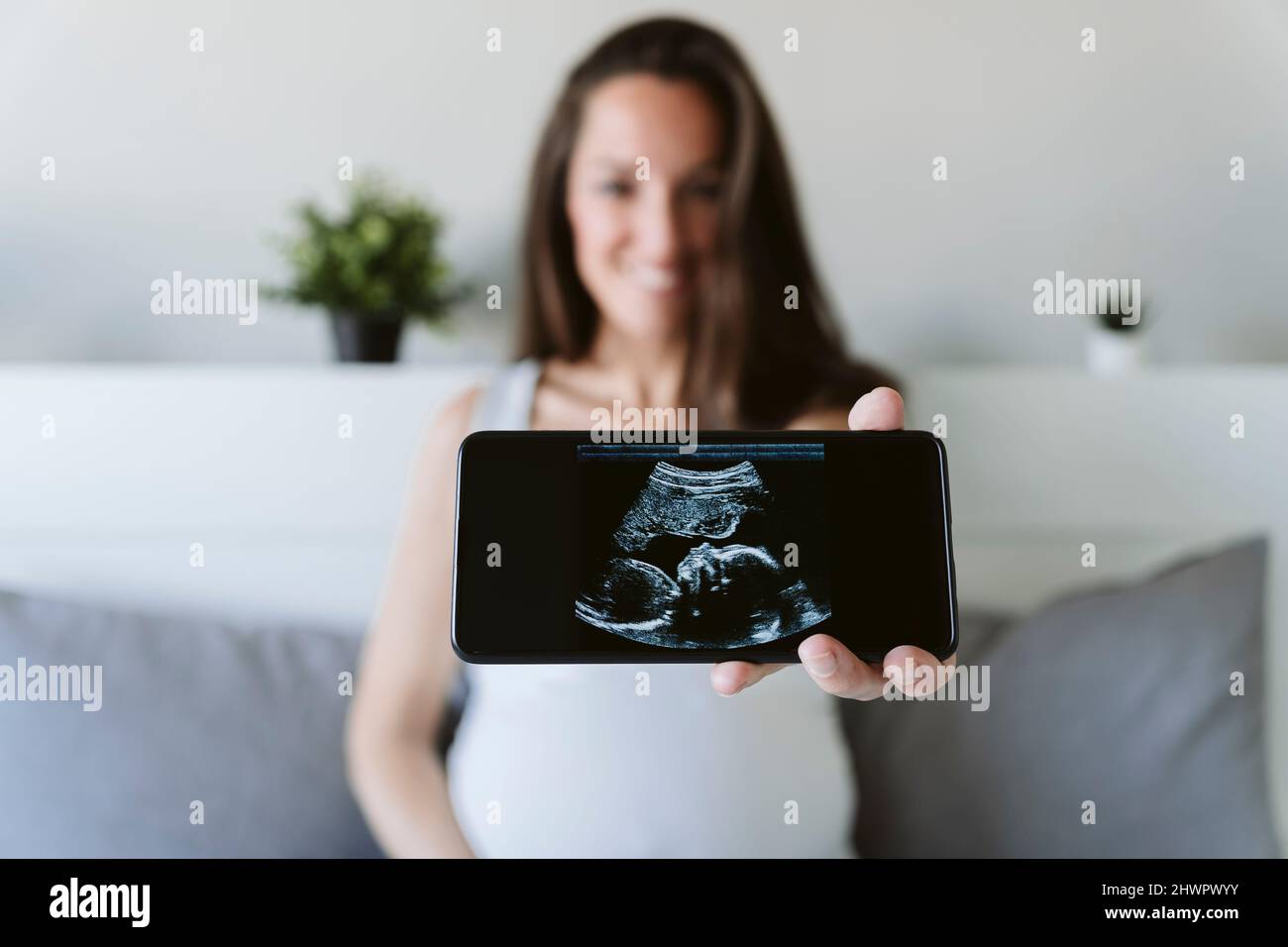 Woman showing ultrasound image hi-res stock photography and images - Alamy