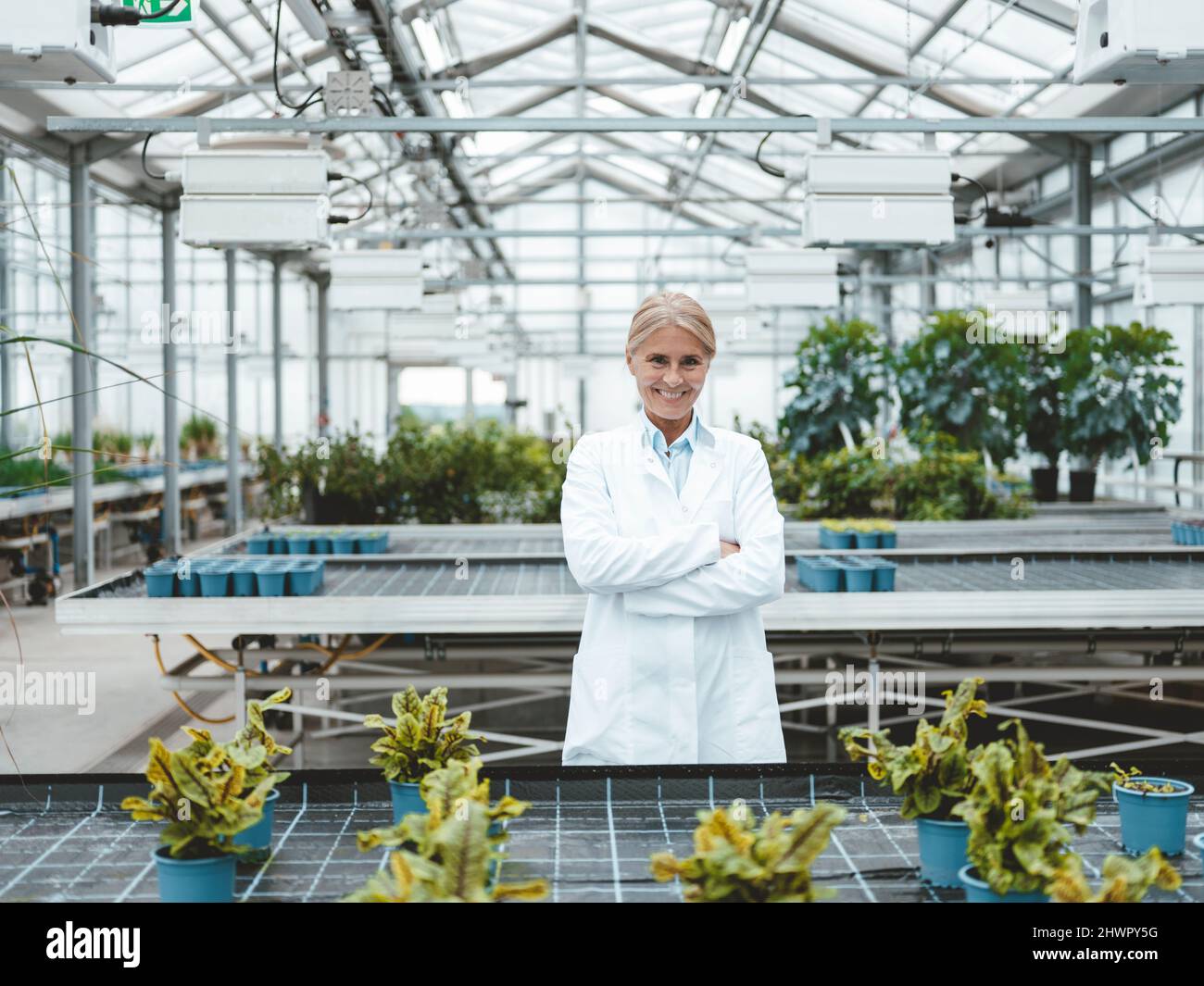Happy scientists smiling camera hi-res stock photography and images - Alamy