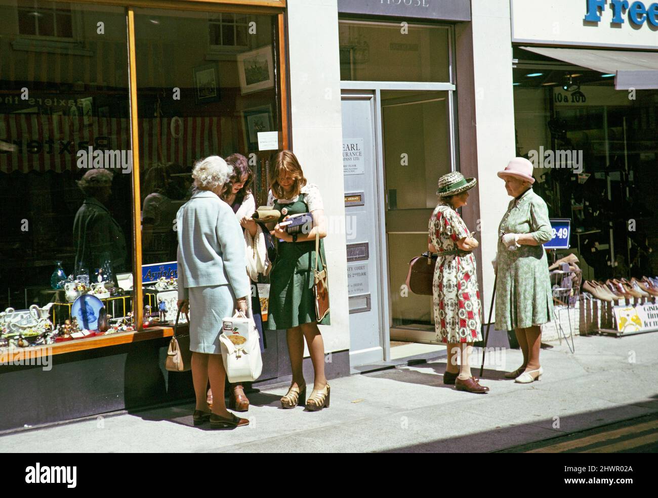 Female secondary school students engaged in geography fieldwork, UK ...