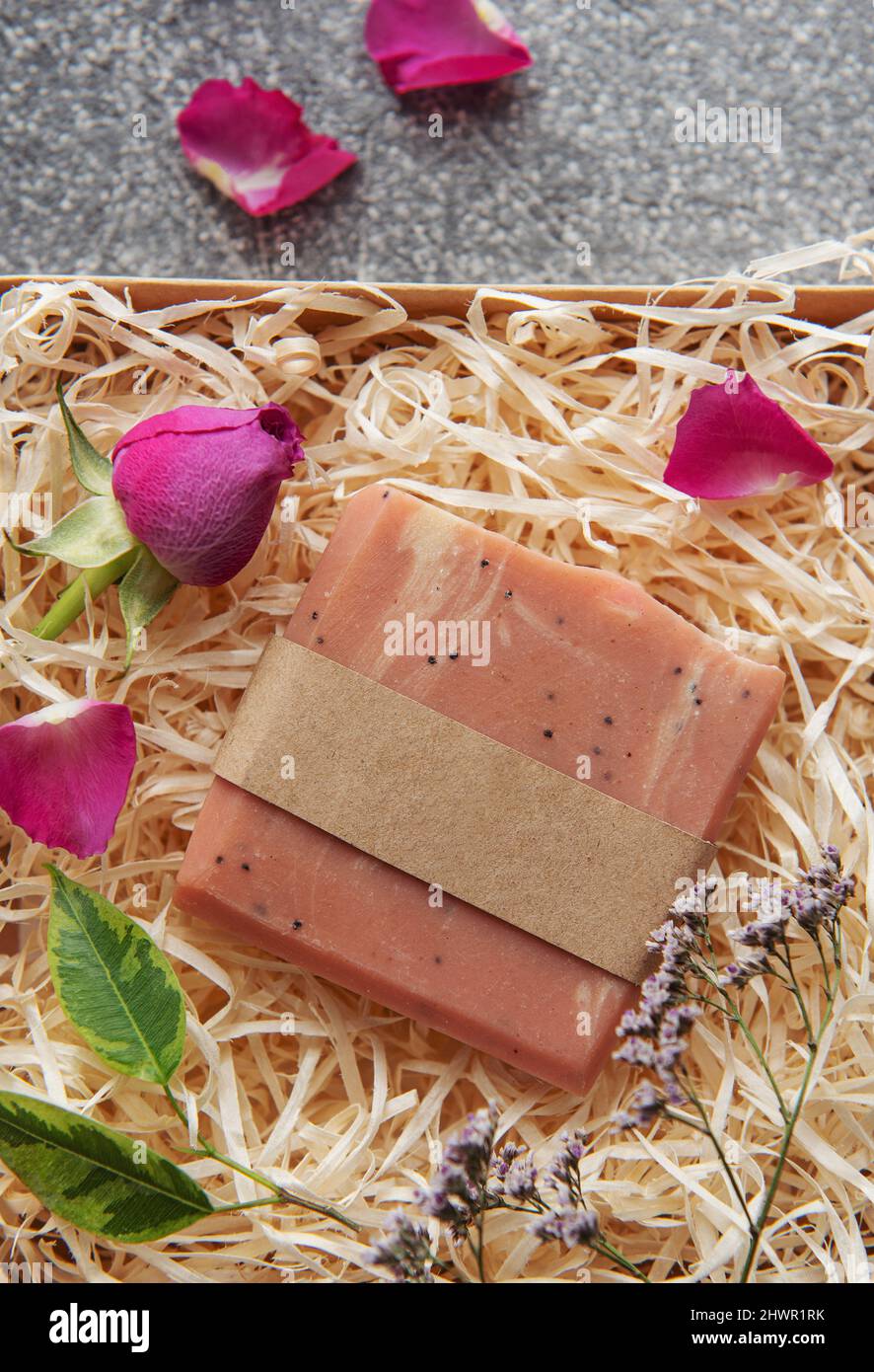 Natural handmade soap with rose petals on straw background Stock Photo ...