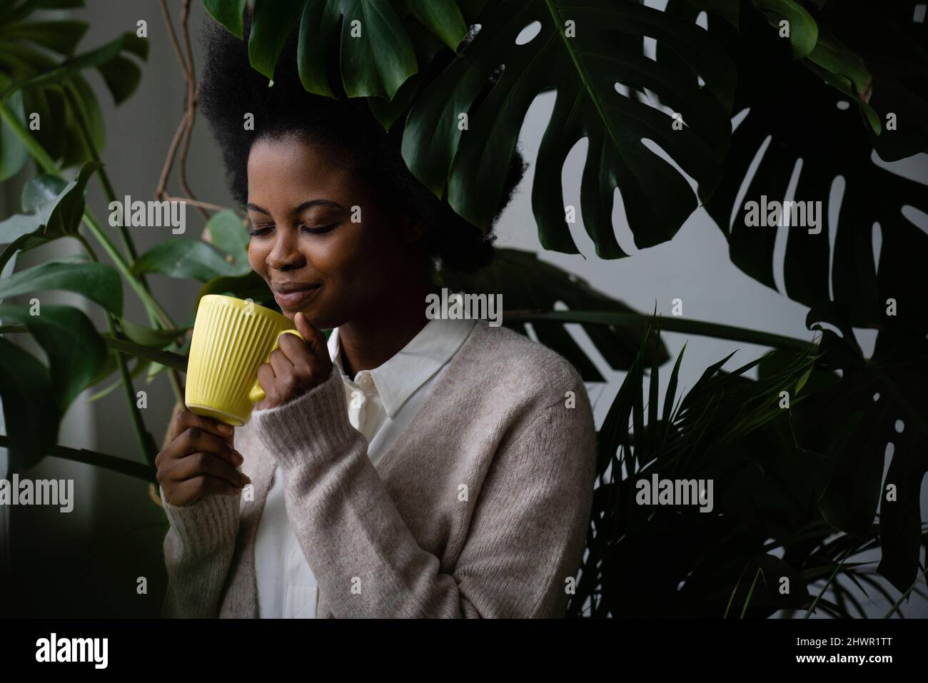 Woman green drink eyes closed hi-res stock photography and images - Alamy