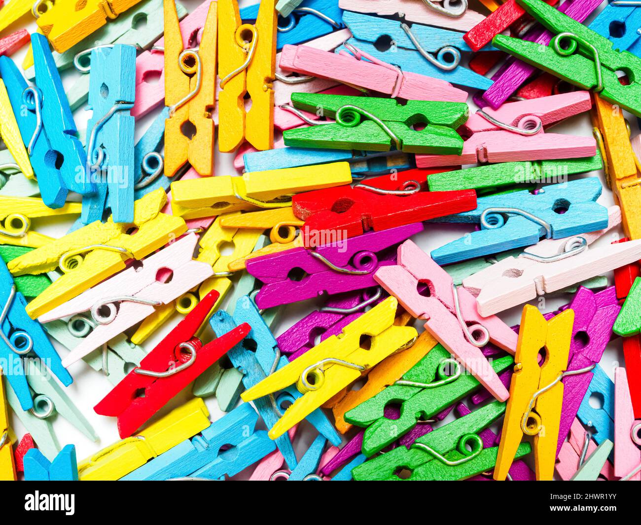 colorful wooden clothespins background Stock Photo - Alamy