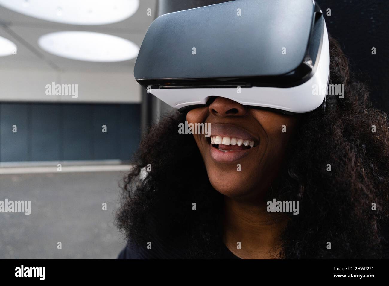 Smiling african american woman headset hi-res stock photography and ...