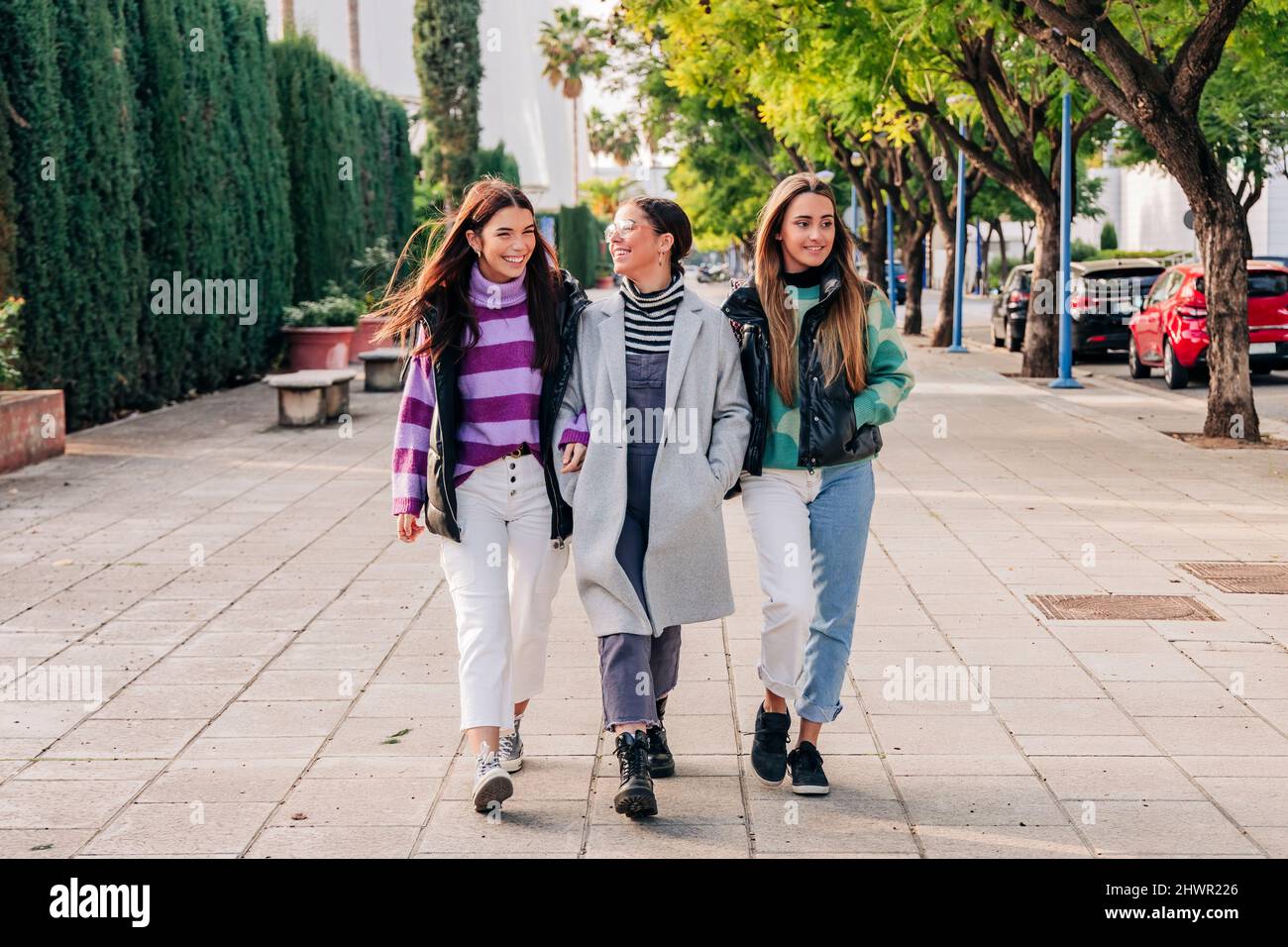Walking together togetherness side by side hi-res stock photography and ...