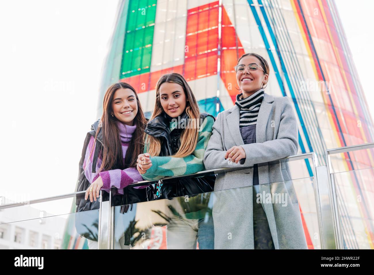 Women leaning on railing hi-res stock photography and images - Alamy
