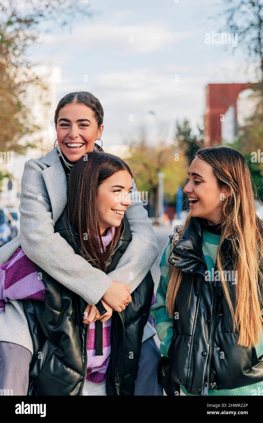 Group young people carrying hi-res stock photography and images - Alamy