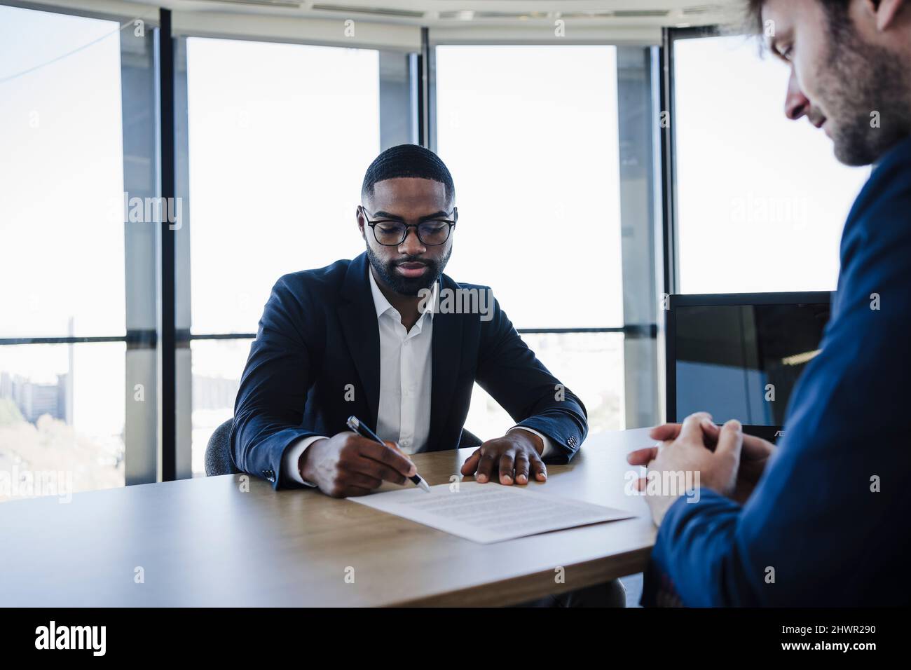 Client signing contract in office Stock Photo - Alamy Client signing contract in office Stock Photo - Alamy