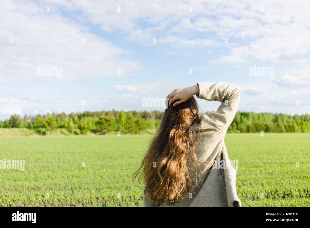 Woman rear view field light hair hi-res stock photography and images ...