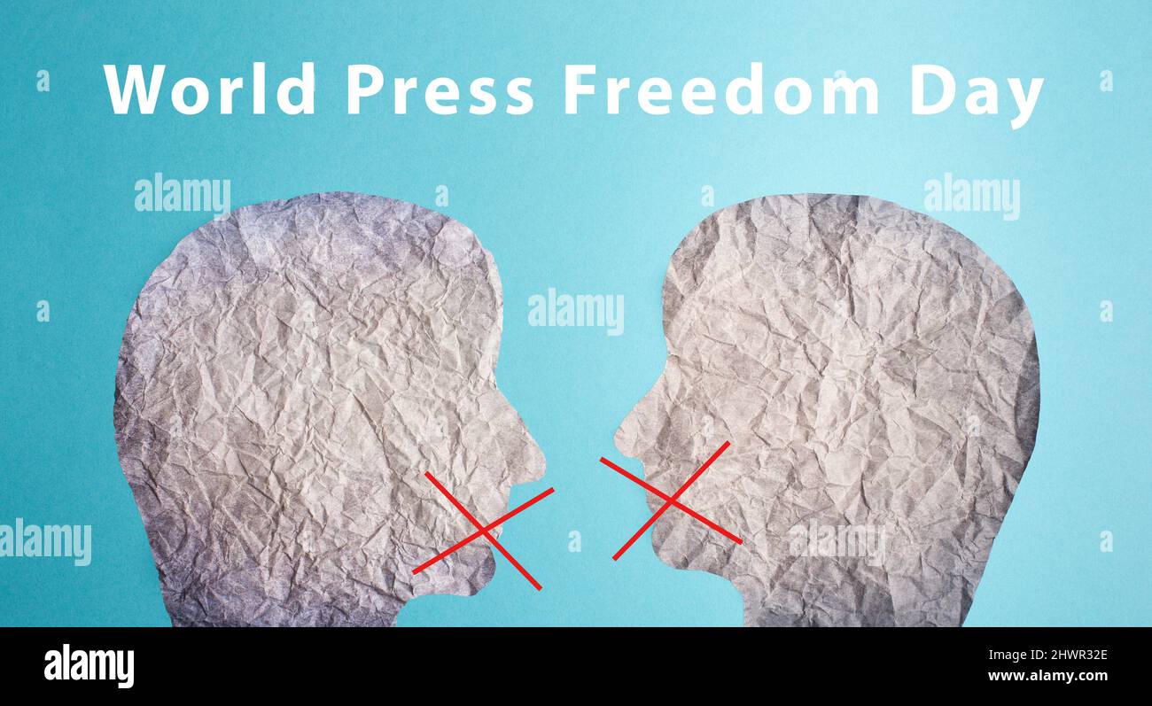 World Press Freedom Day, silhouette of a journalist, mouth covered ...