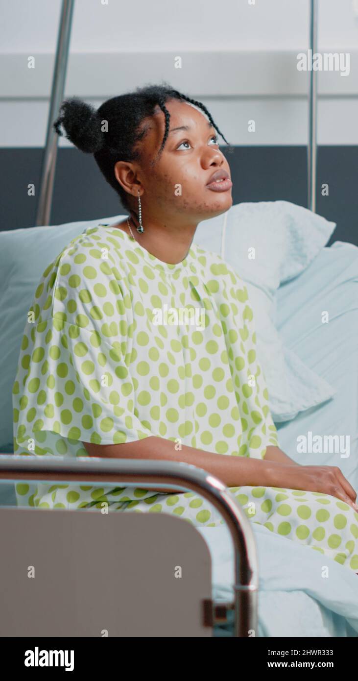 Sick patient waiting on doctor to give treatment and support while ...