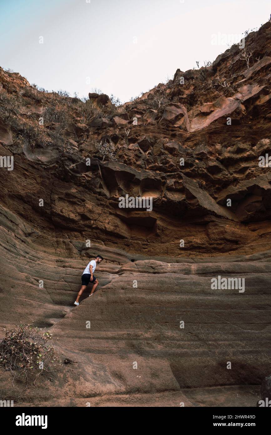Man climbing steps rock formation hi-res stock photography and images ...