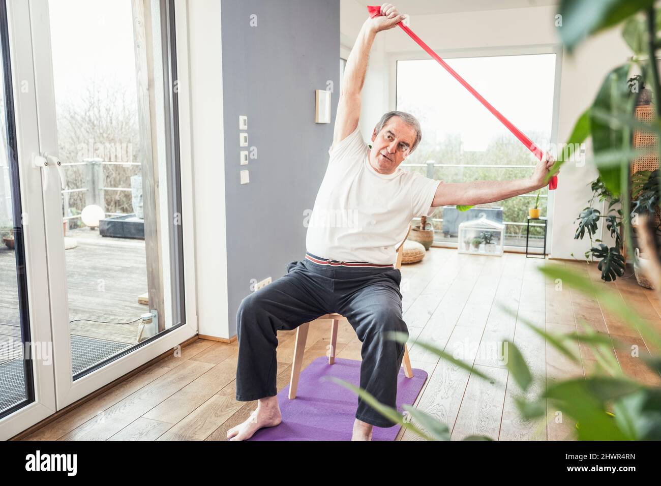 Man resistance band gym hi-res stock photography and images - Alamy