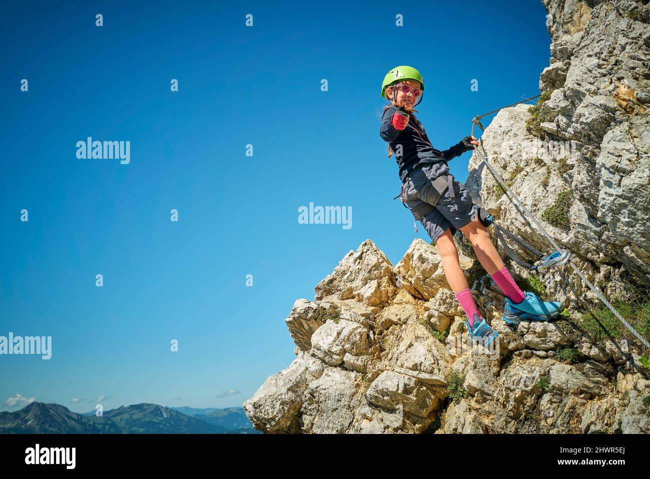 Children climbing on sign hi-res stock photography and images - Alamy