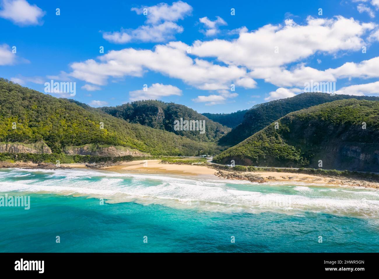 Australia, Victoria, Aerial view of beach and forested hills along ...