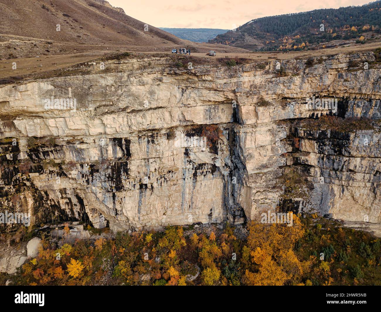 Aerial view of steep mountain cliff in autumn Stock Photo - Alamy