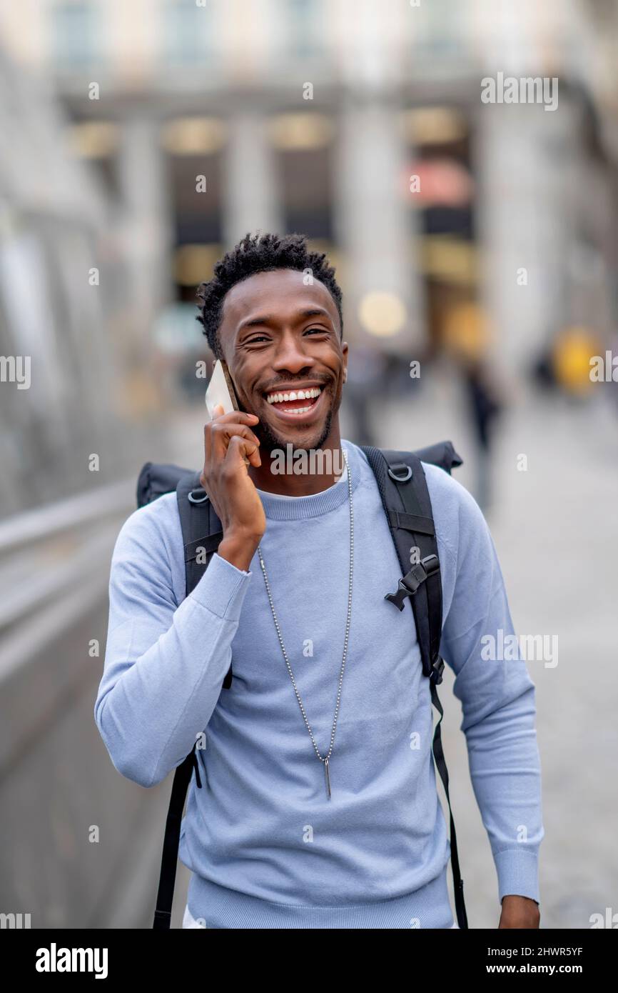 Young black man talking young people hi-res stock photography and ...