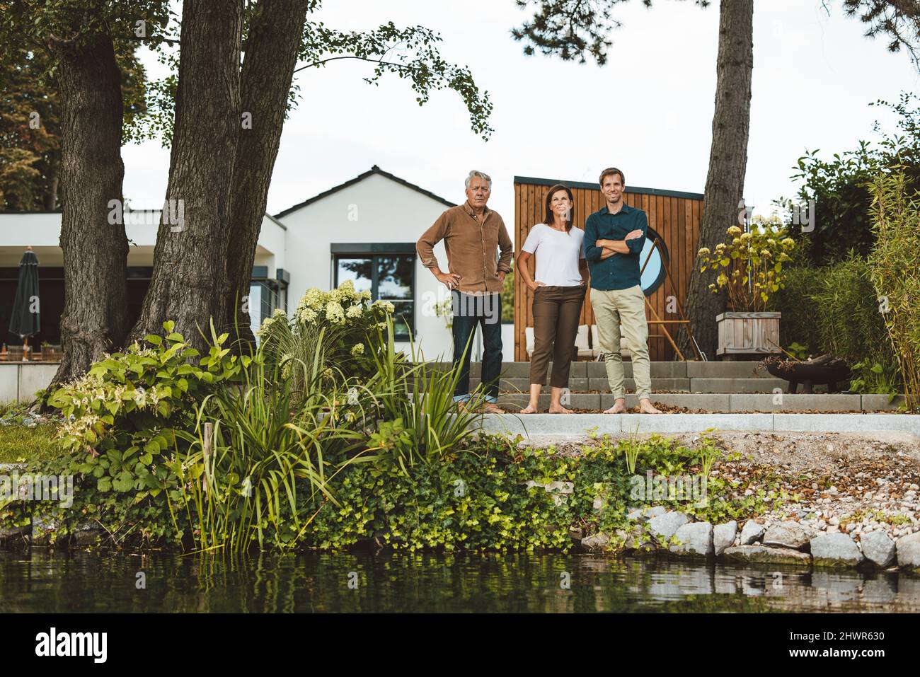 Family adult son standing together hi-res stock photography and images ...